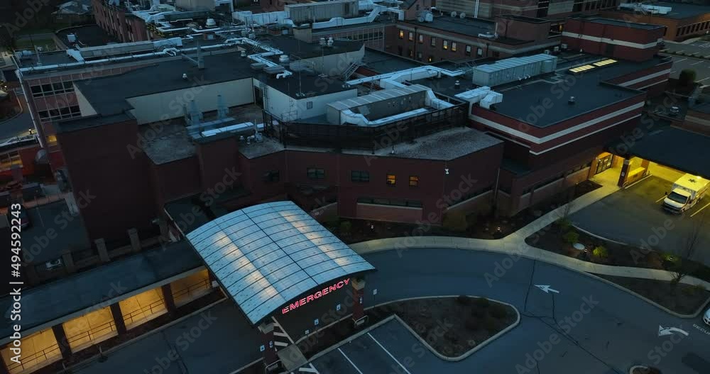 Exterior outside view of hospital emergency room entrance and ambulance ...