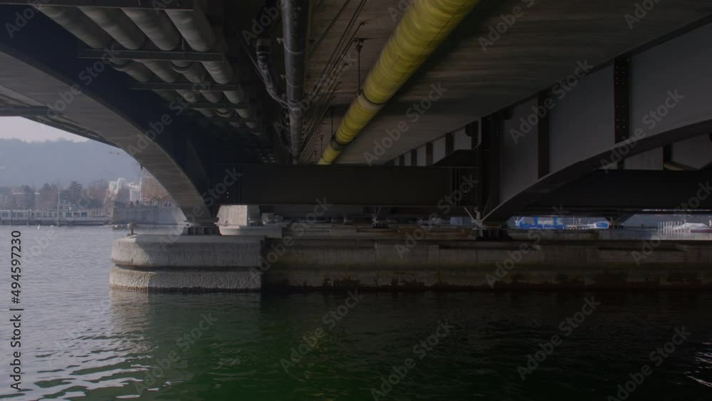 Engineering construction of a bridge on the river. The supports are in ...