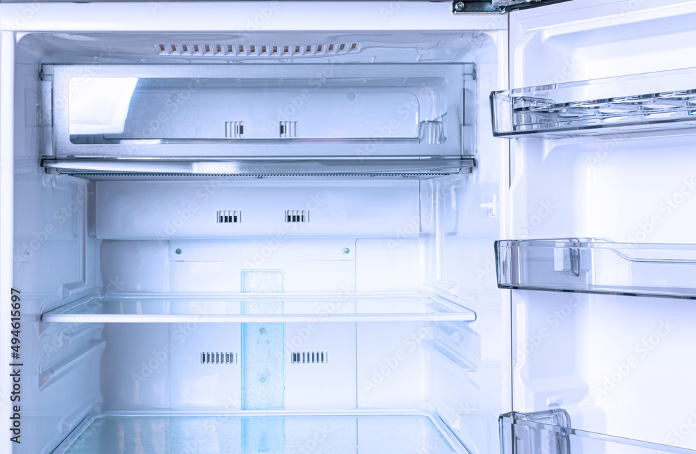 new modern refrigerator opens to reveal the inside. Stock Photo | Adobe ...