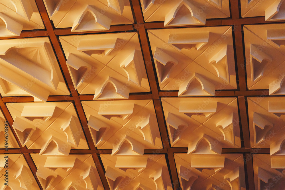Cellular ceiling in the building close-up. Moldings on the ceiling in ...