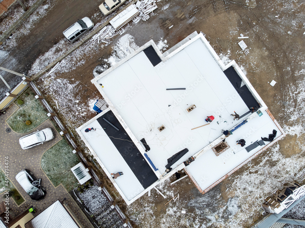 Poster Roofing construction worker installing a flat roof – Wall Art ...