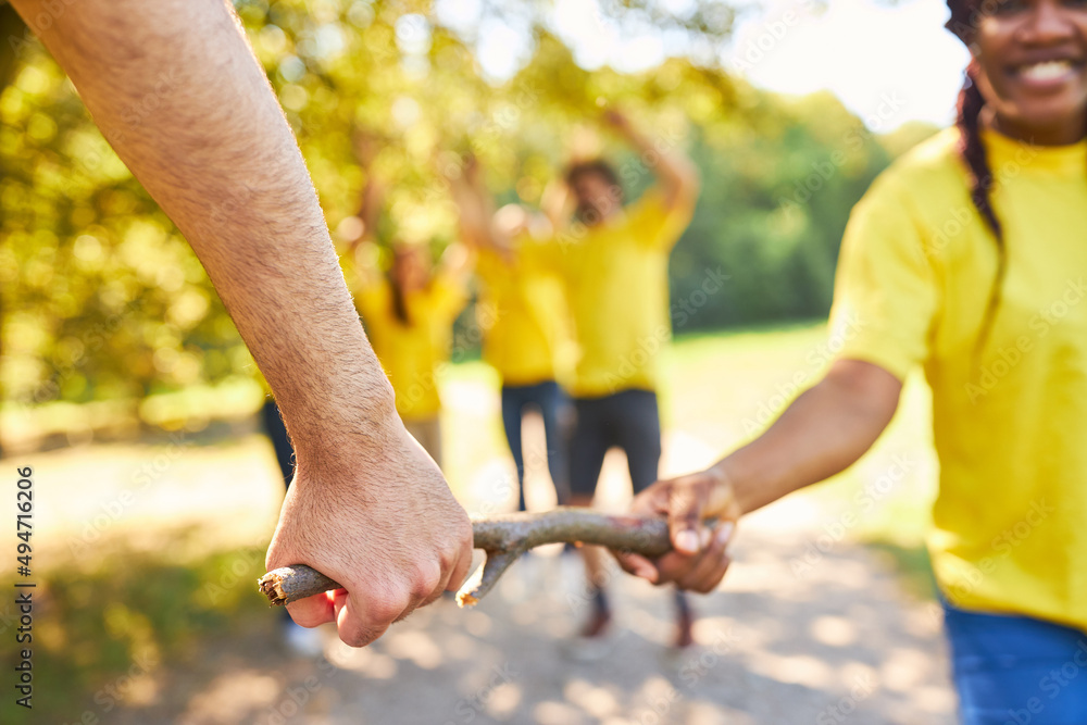 People at relay race as a team building exercise in nature Stock Photo ...