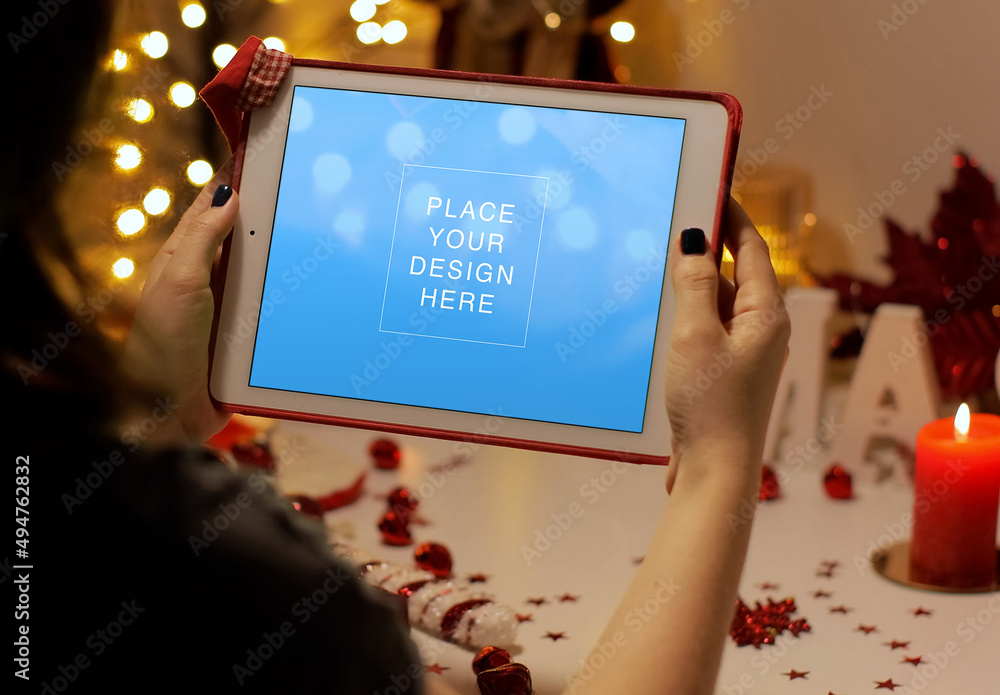 Christmas Mockup iPad Tablet on Woman's Hands Stock Template | Adobe Stock