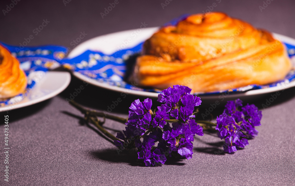 Focus on the foreground of a floral arrangement with limonium flowers ...