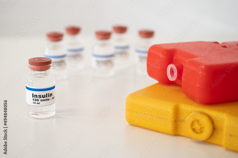 Insulin vials with cold packs against a white background: properly ...
