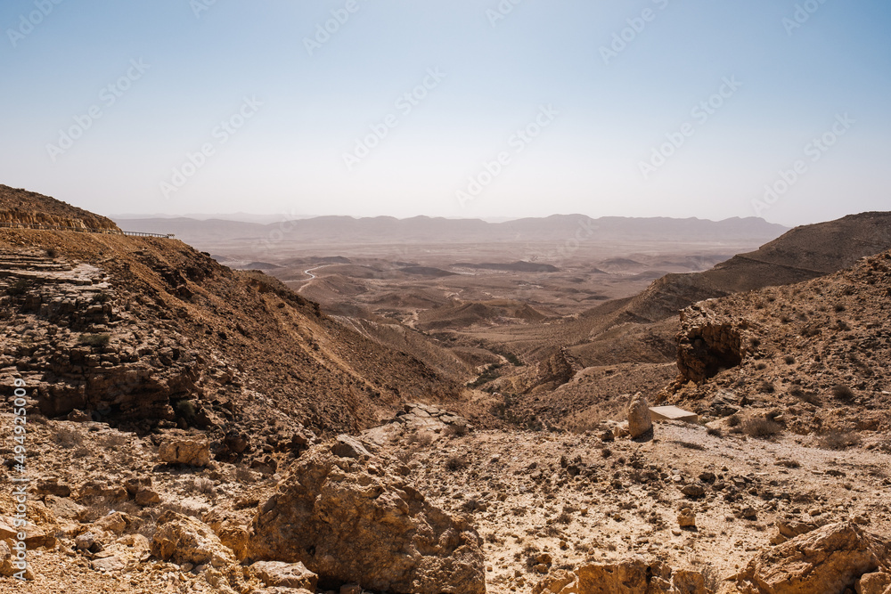 Beautiful scenery of dry desert with rocky cliffs on the background of ...