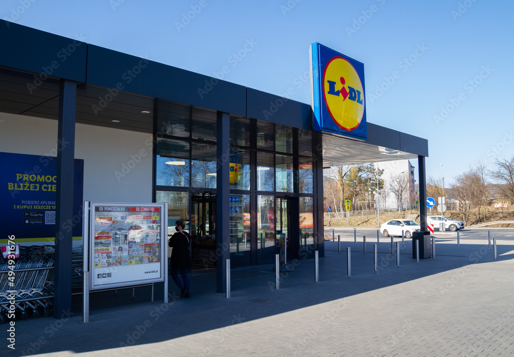 Lidl shop entrance, with brand logo signboard. German international ...