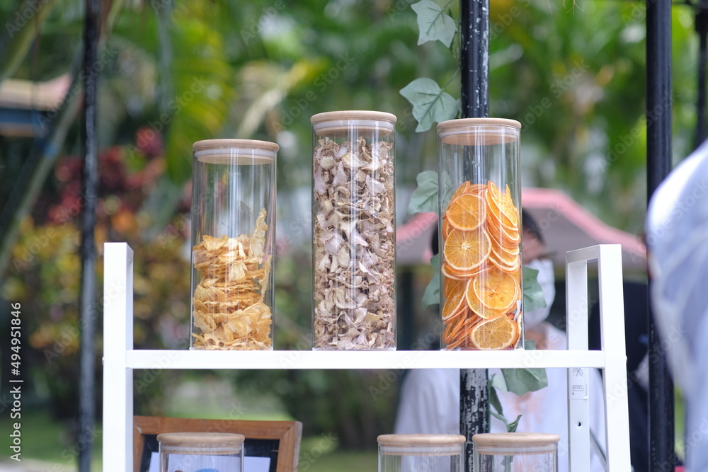 Slices of dried fruit in a jar to be consumed as a healthy snack. Stock ...