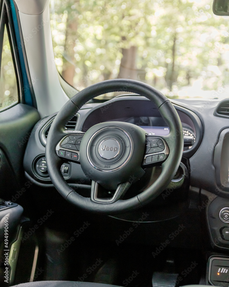 Jeep Renegade SUV 4x4 interior view cockpit, steering wheel and buttons ...