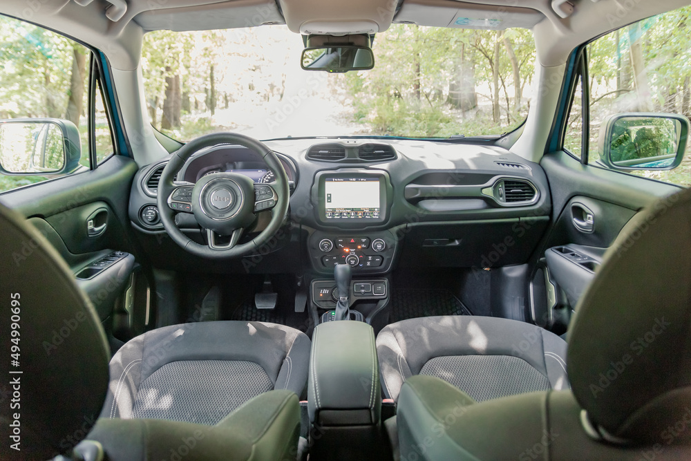 Jeep Renegade SUV 4x4 interior view cockpit, steering wheel and buttons ...