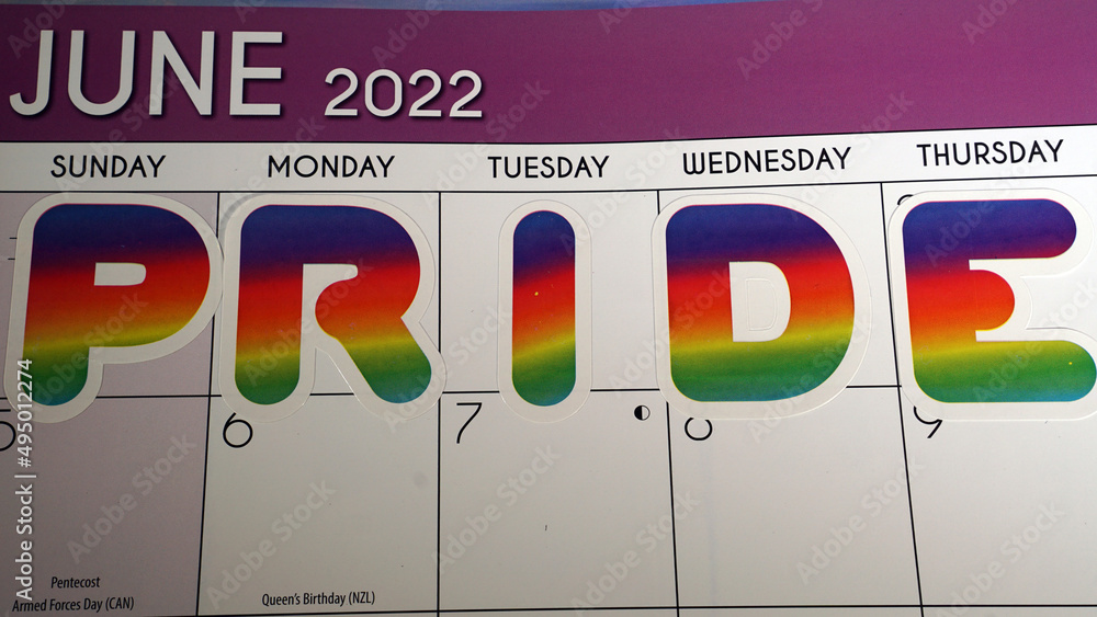 Pride month marked on the calendar in June with rainbow letter stickers ...