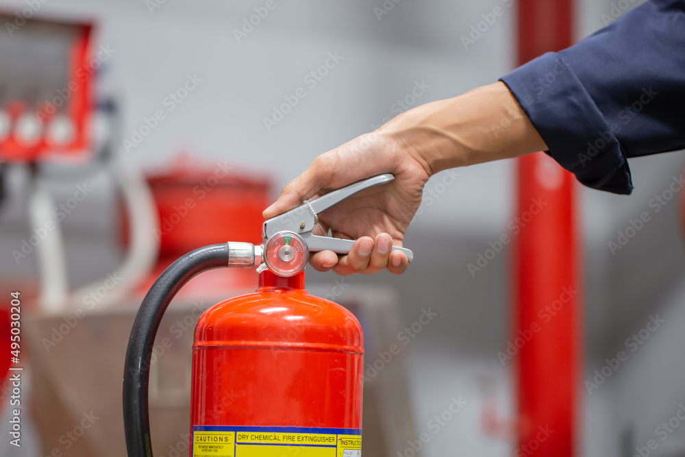 Engineer are checking and inspection a fire extinguishers tank in the ...