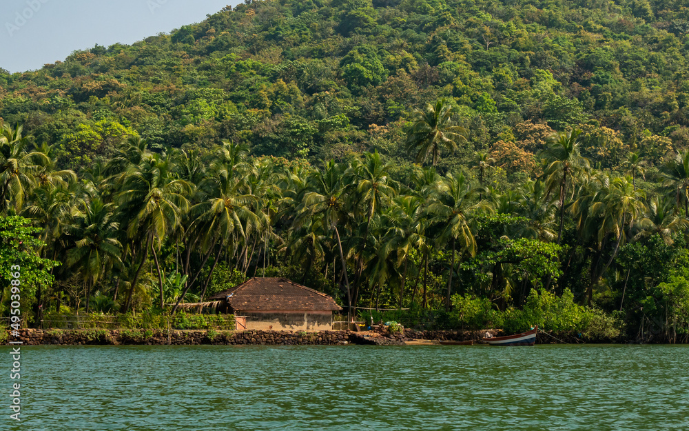 Indian house with traditional roof design at beach side of Maharashtra ...