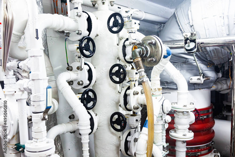 Valve system with pipes in the engine room on the vessel. Stock Photo ...