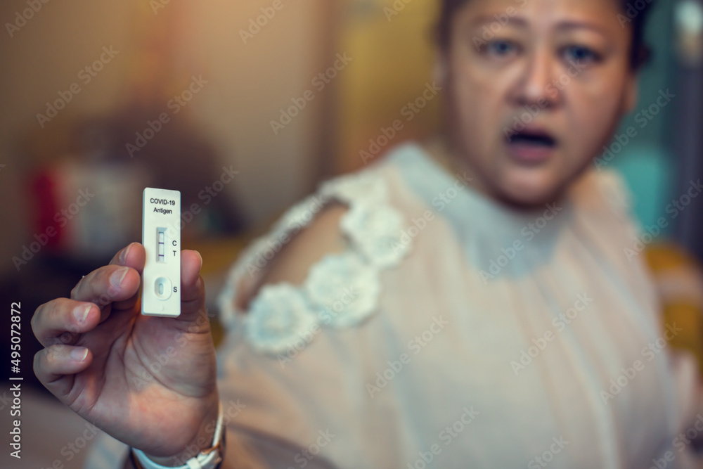Selective focus to Rapid Antigen Test kit (ATK) with Positive result ...
