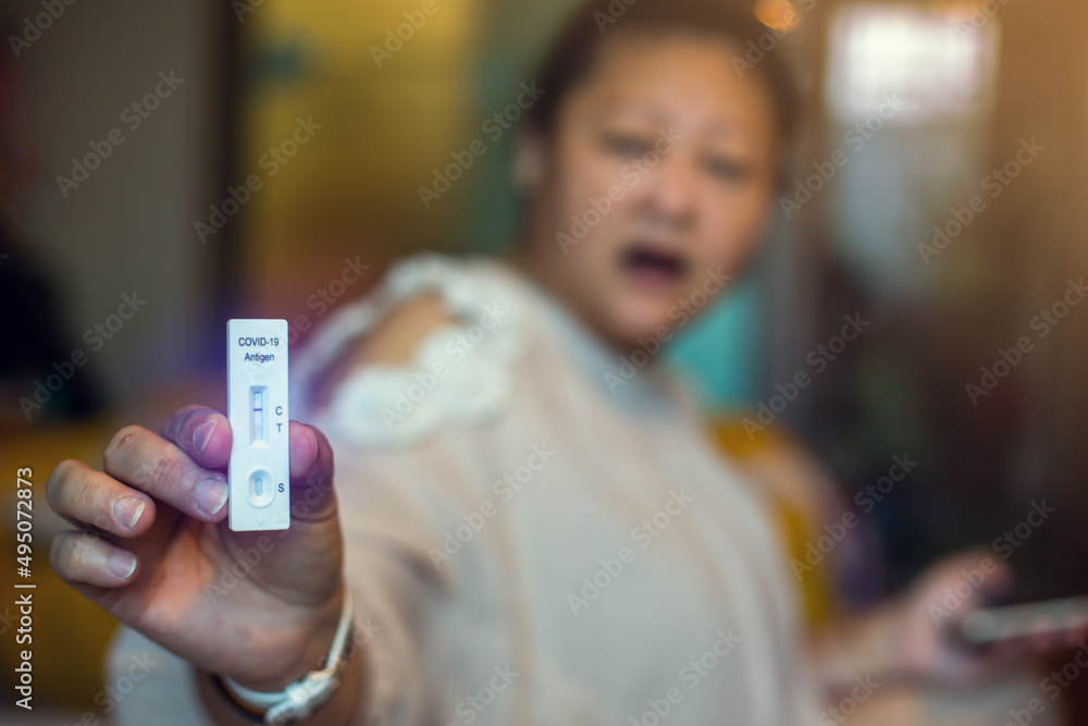 Selective focus to Rapid Antigen Test kit (ATK) with Positive result ...