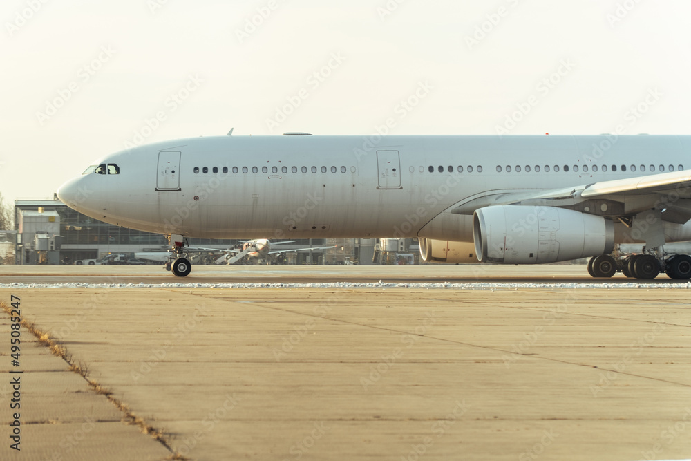Airbus A330 taking off from the international airport. Cargo white ...