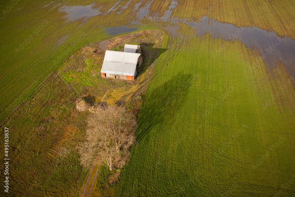 Aerial View of a Vintage Red Barn in the Middle of a Farm Field. Rural ...