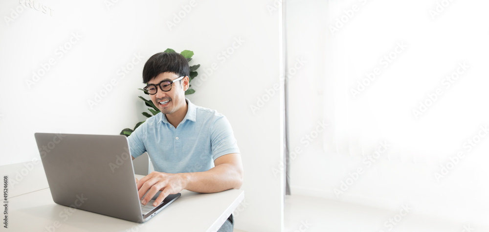 asian man work using computer hand typing laptop keyboard contact us ...