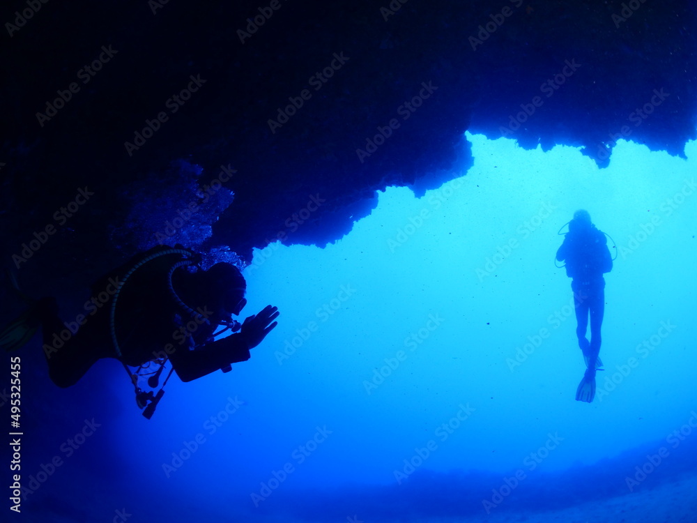 cave diving underwater scuba divers exploring caves and having fun ...