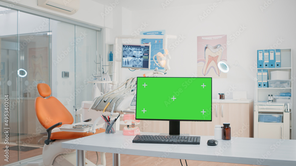 Nobody in dental cabinet with green screen on computer for teethcare ...