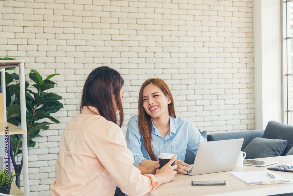 Happiness two women working together confident team meeting in office ...