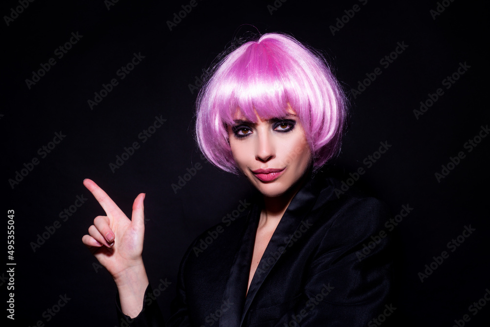 Beautiful sexy woman in pink wig, isolated on black. Point of sale ...