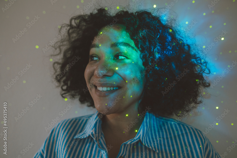 Astro light effect falling on face of woman in front of wall Stock ...