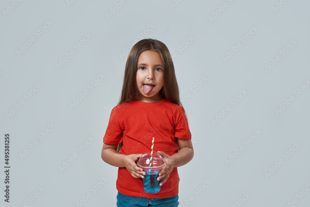 Little girl licking lips after drinking soda drink Stock Photo | Adobe ...