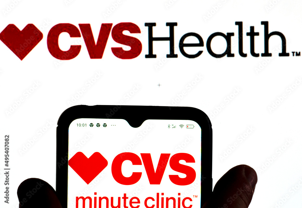 In this photo illustration, the CVS Minute Clinic logo is displayed on ...