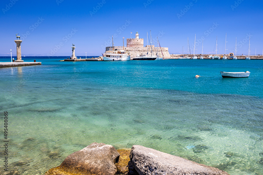 Entrance to Mandraki harbor and marina. Hirsch and Hirschkuh, Elafos ...