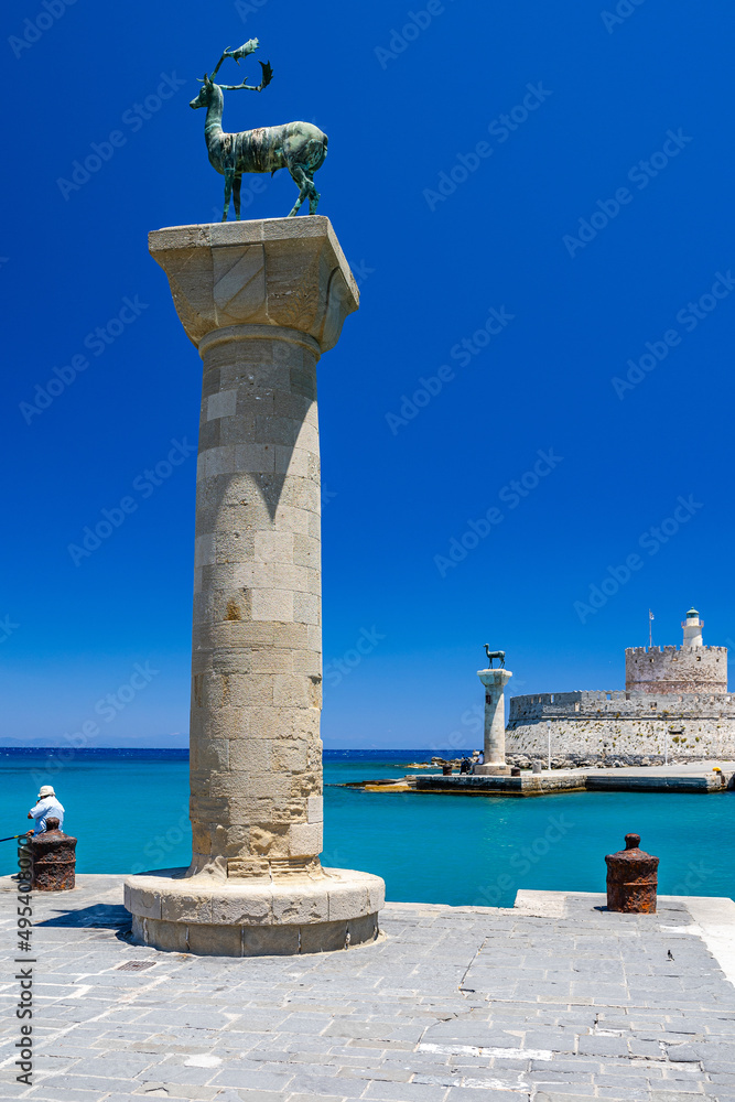 Entrance to Mandraki harbor and marina. Hirsch and Hirschkuh, Elafos ...
