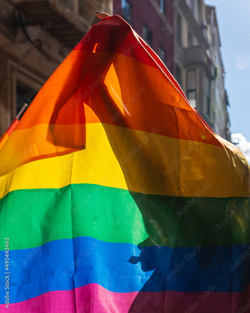 Person holding Pride flag outdoor Stock Photo | Adobe Stock