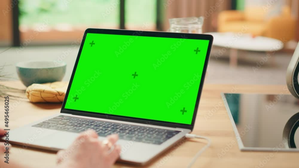Close Up Green Screen Mock Up on a Laptop Computer. Device is Used on a ...