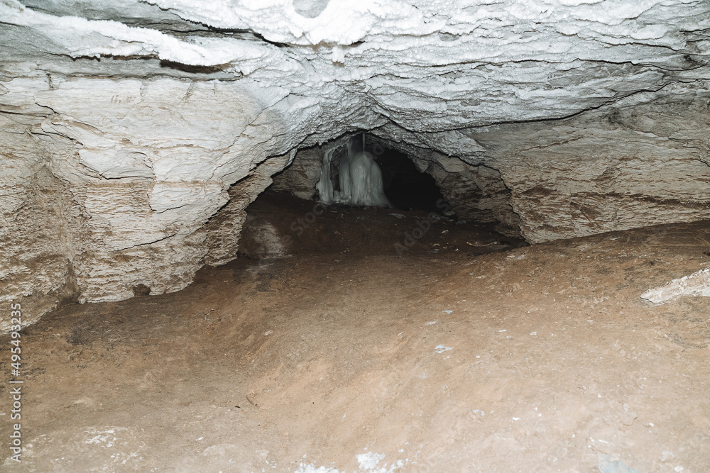 Underground cave deep, long passage in the karst cavity of the mountain ...