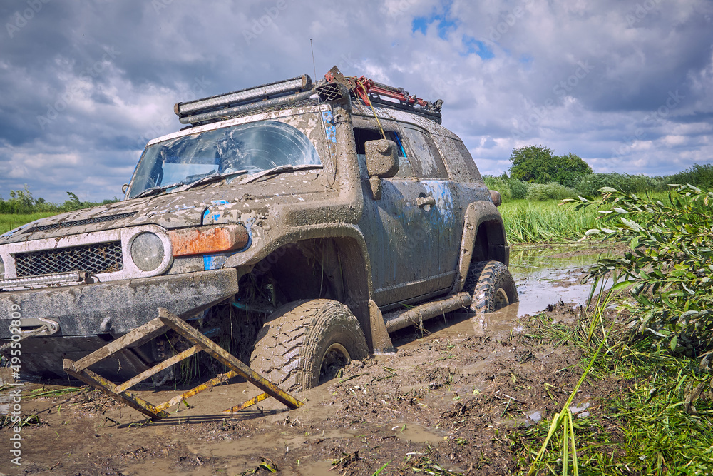 Off-road vehicle got stuck on impenetrable road after rain during ...