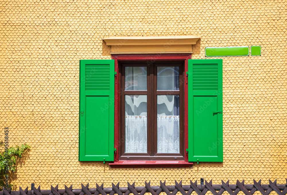 Old wooden window with blinds and curtains. Scenic original and ...