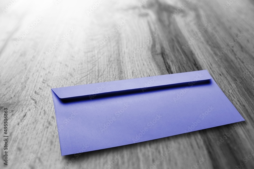 Navy violet envelope on desk. Kraft paper with subtle fibers. Stock ...