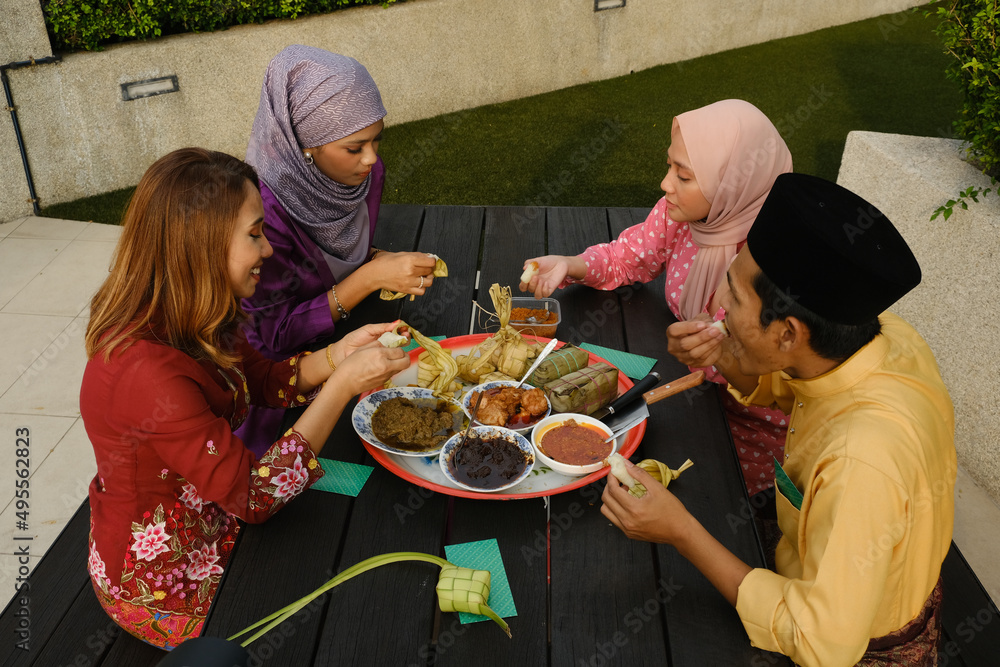 A picture of family having gathering during "Hari Raya Aidilfitri" at ...