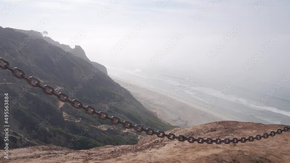 Steep unstable cliff, rock or bluff, foggy weather, California coast ...