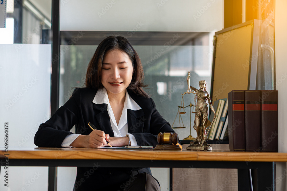 Lawyer's Office. The goddess of justice with scales and lawyers working ...