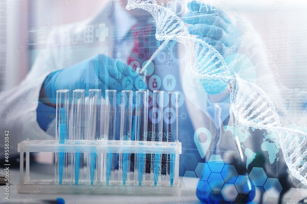 Scientist with tube pcr and virtual screen with data scientific at ...