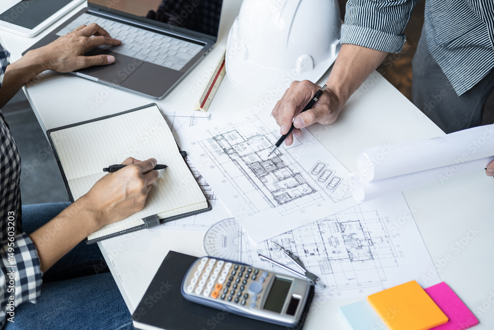 Architecture Engineer Teamwork Meeting, Drawing and working for ...