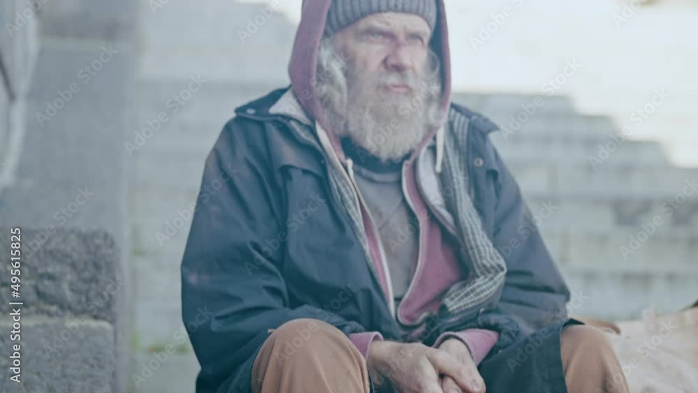Depressed homeless man in dirty wear sitting on street stairs, social injustice Stock ビデオ ...
