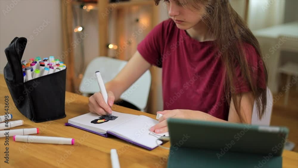 Young artist girl drawing by markers in sketchbook Stock Video | Adobe ...