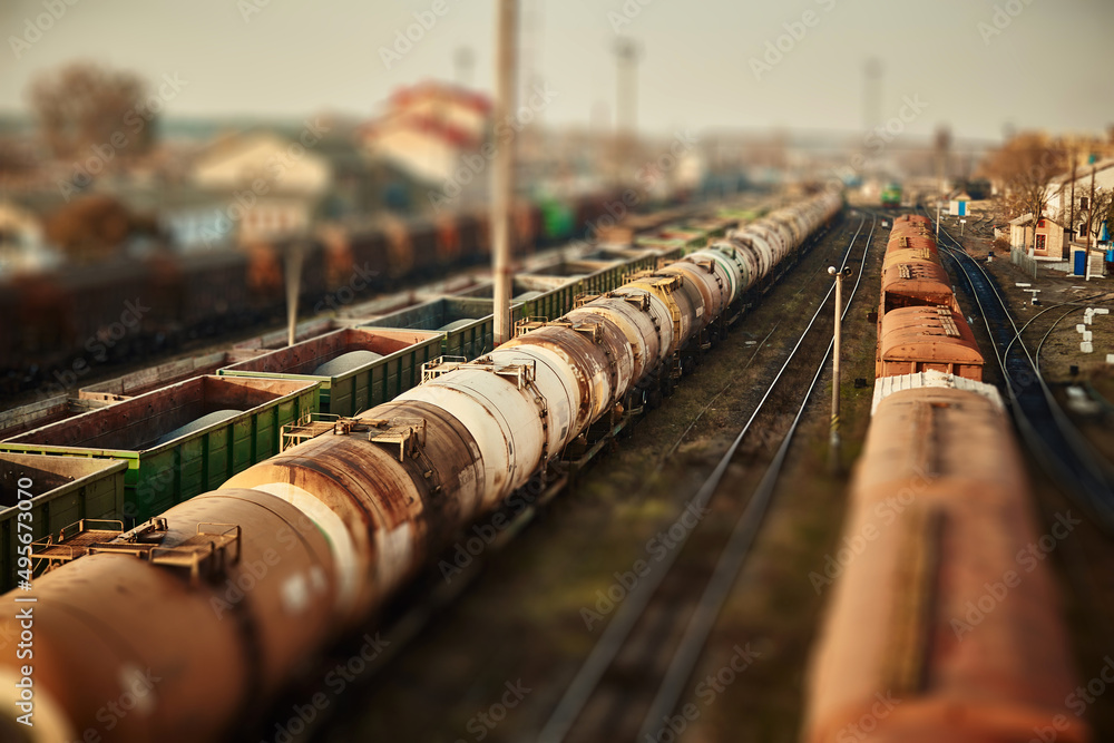 Freight railway cars at the railway station. Top view of cargo trains ...