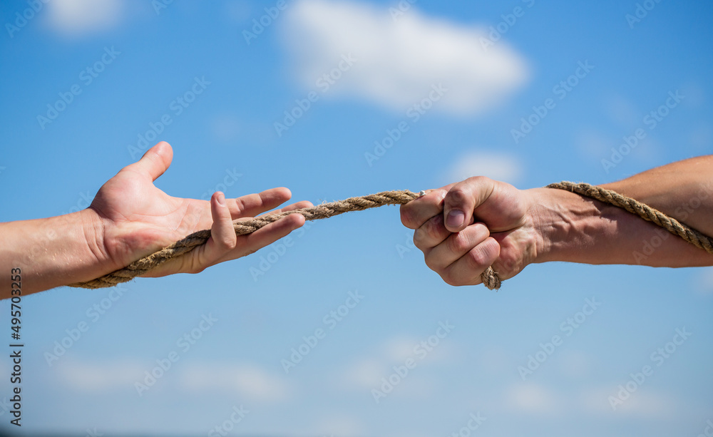 Rope, cord. Hand holding a rope, climbing rope, strength and ...