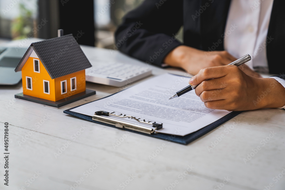 Real estate agent working sign agreement document contract for home ...