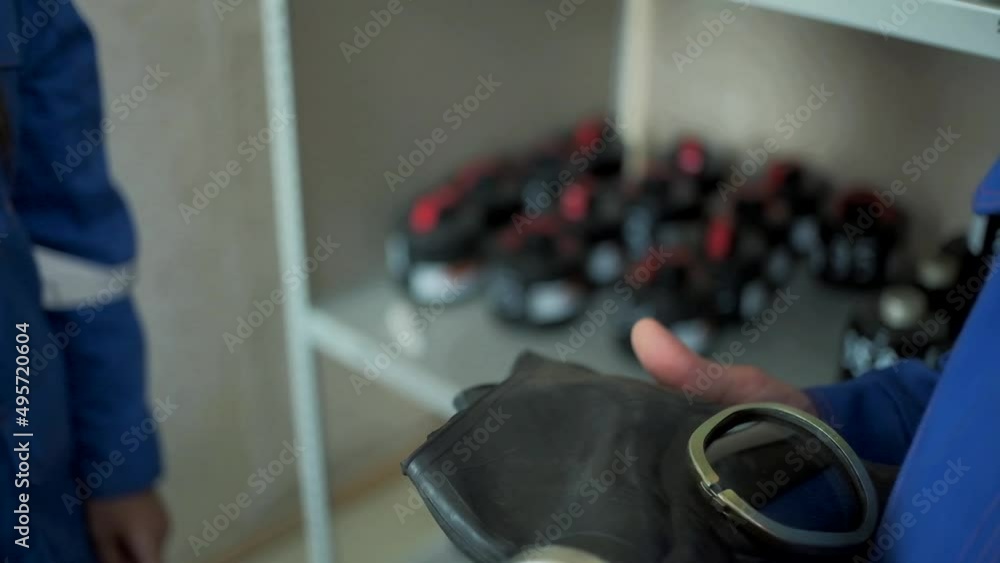 Firefighter going on call. Clip. Close-up of firefighter getting ready ...