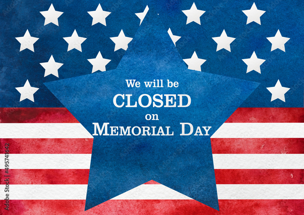Signboard with the inscription We will be closed on Memorial Day and a ...